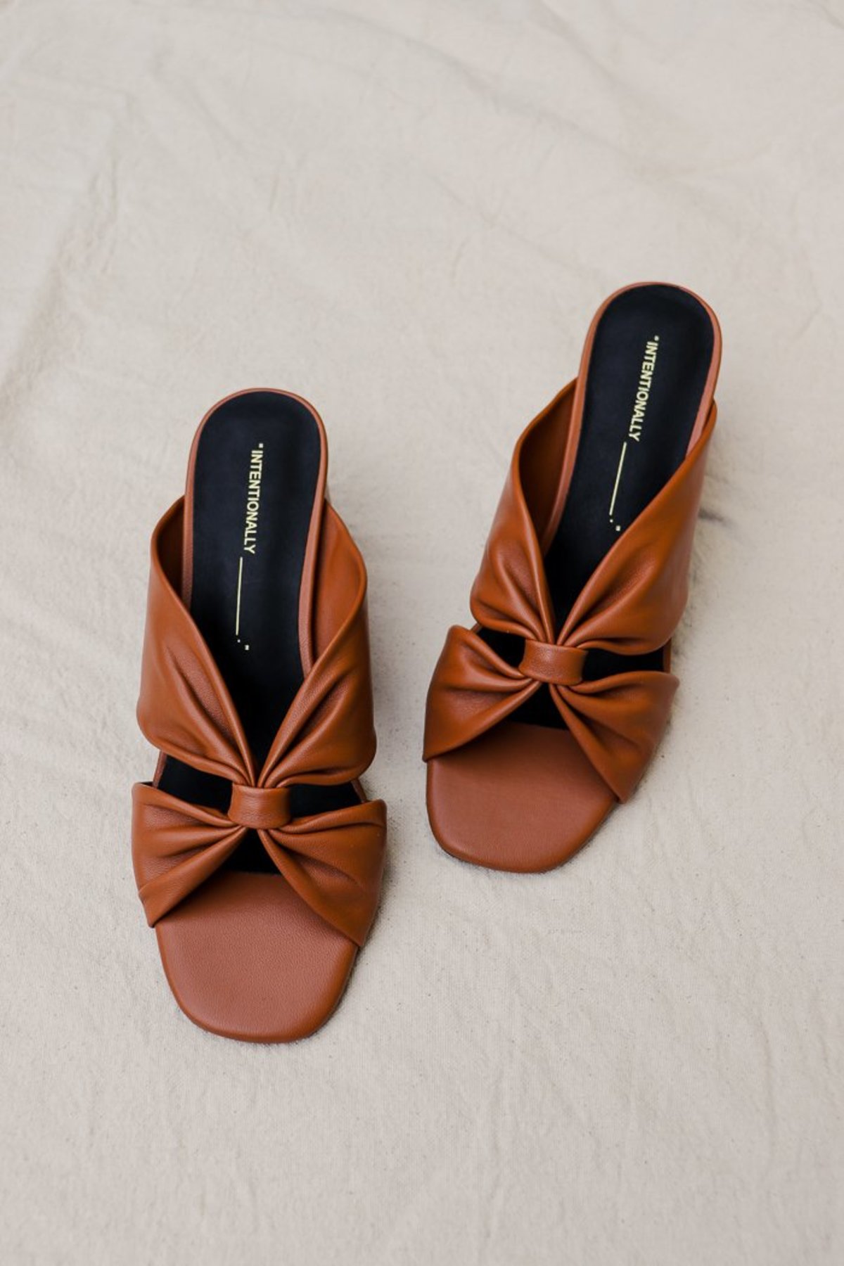 "INTENTIONALLY __________." Hannah Sandal | Garmentory