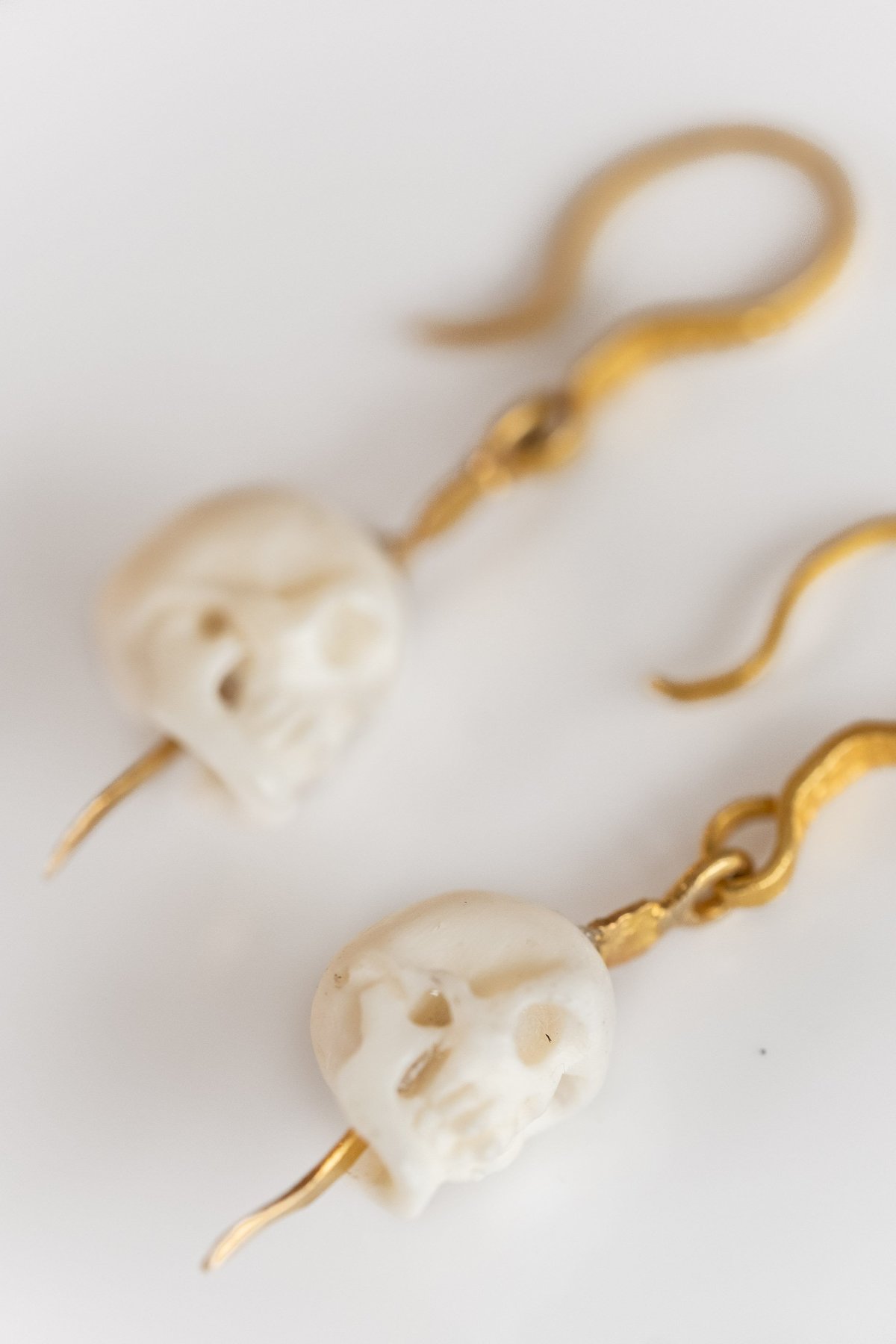 Lou Zeldis CARVED YAK BONE SKULL EARRINGS -22K Yellow Gold | Garmentory